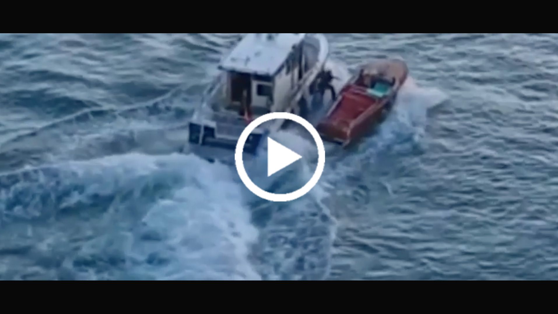 Video: Police officer leaps onto runaway speedboat